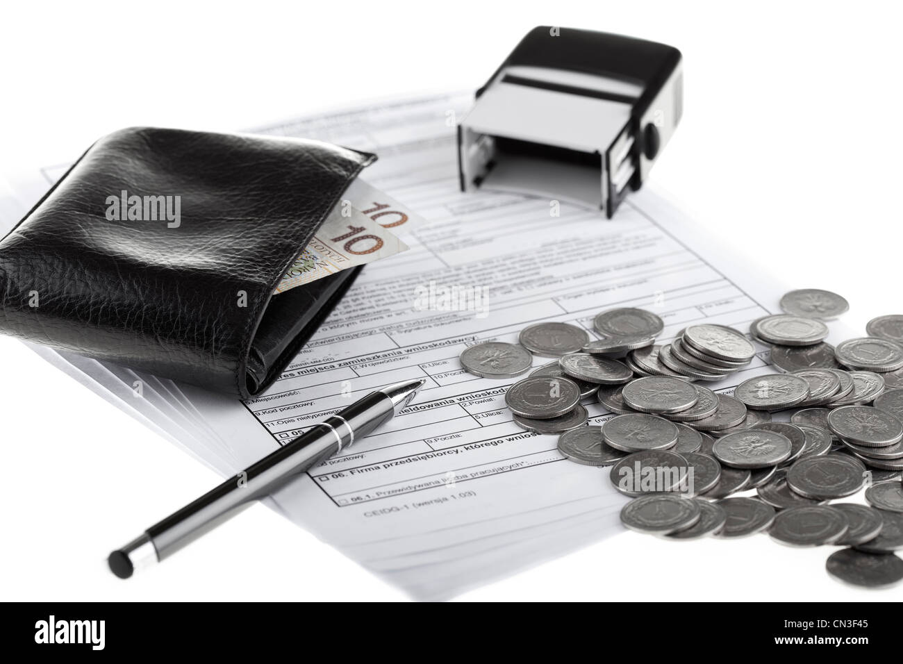 Business documents, wallet with polish paper money, pen, stamp and ...