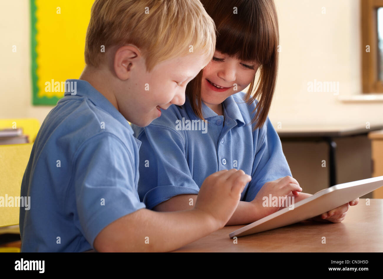 Two children in school uniform hi-res stock photography and images - Alamy
