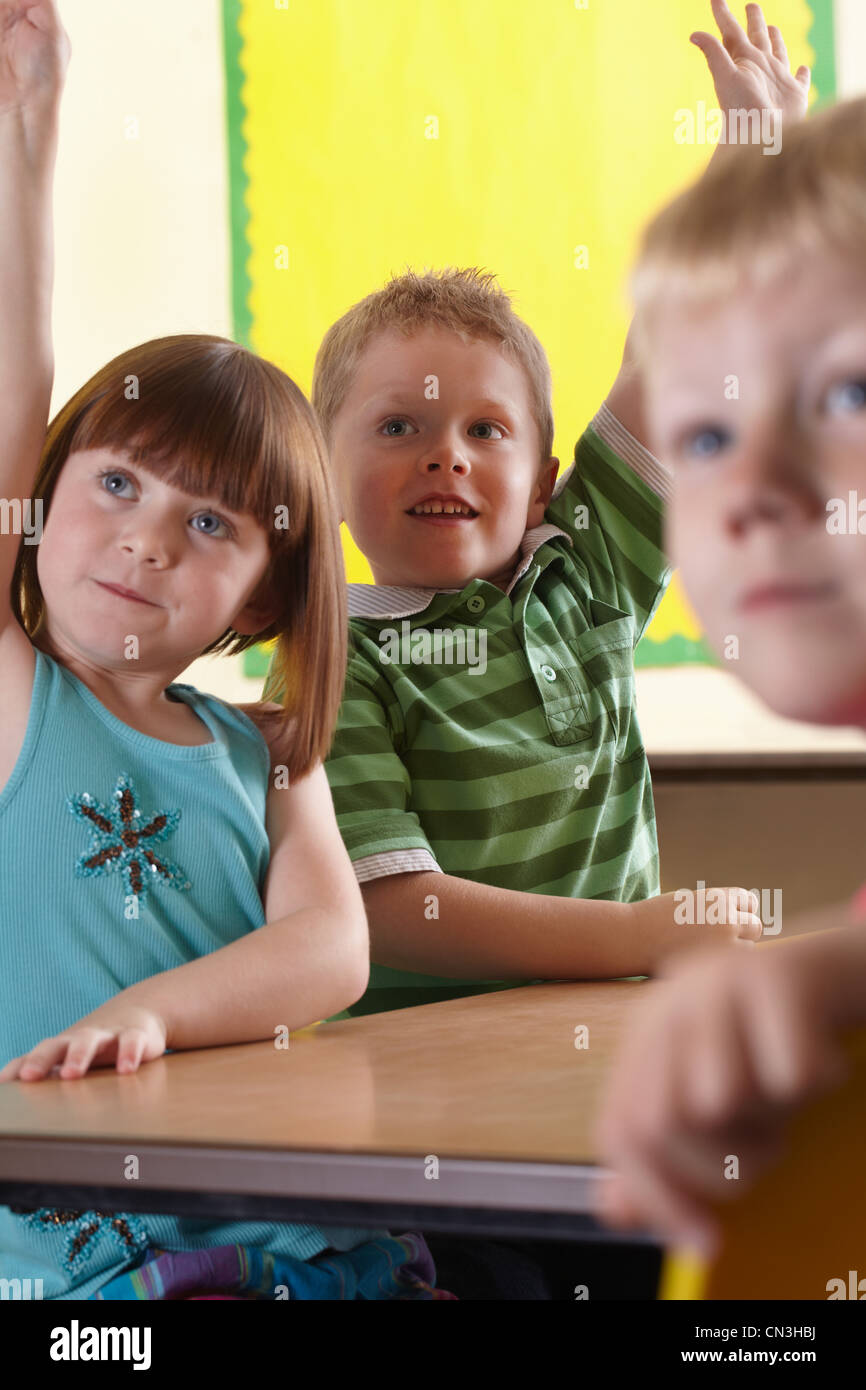 Student answering a question in classroom hi-res stock photography and ...