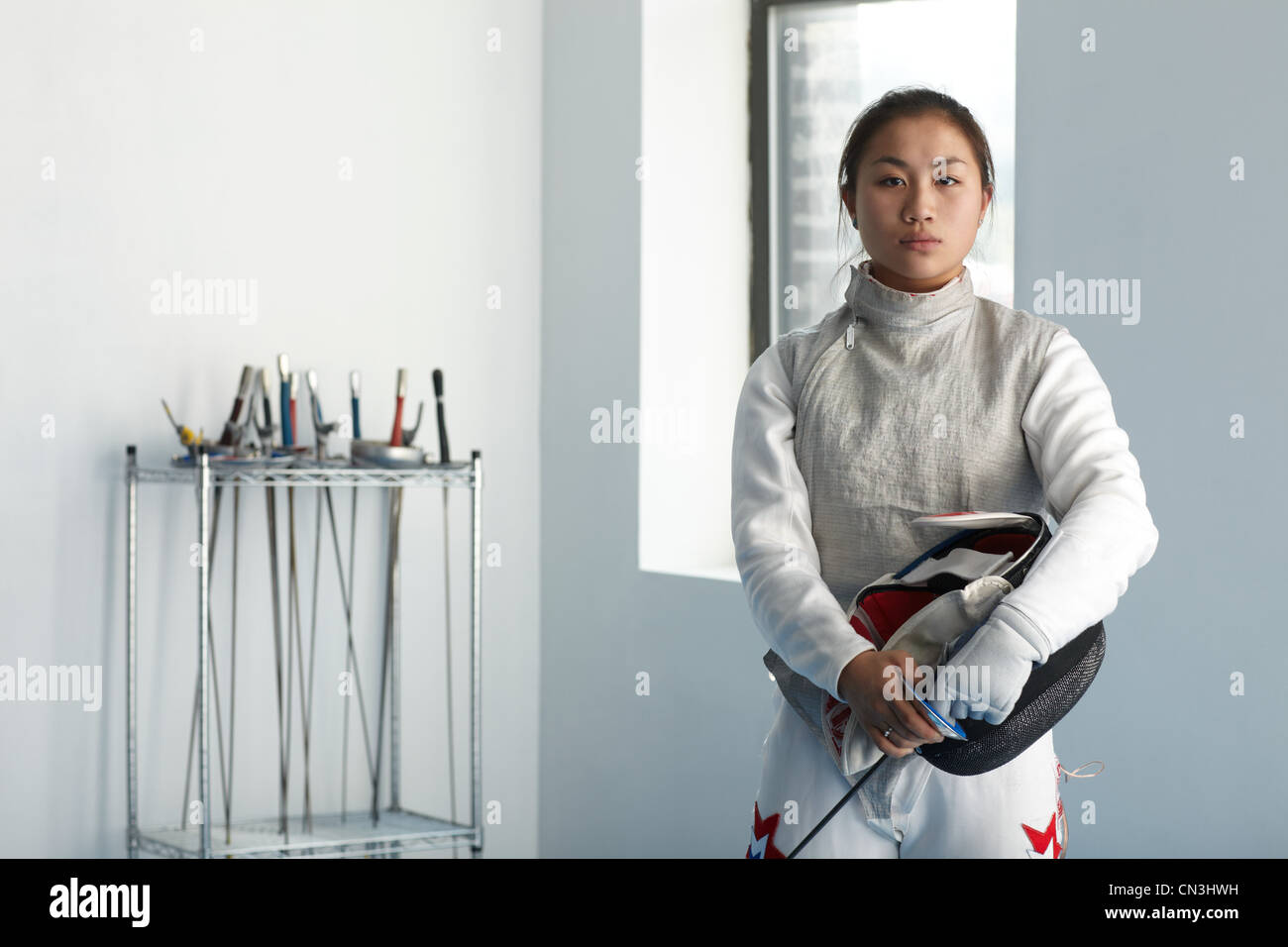 Portrait of teenage female fencer Stock Photo - Alamy