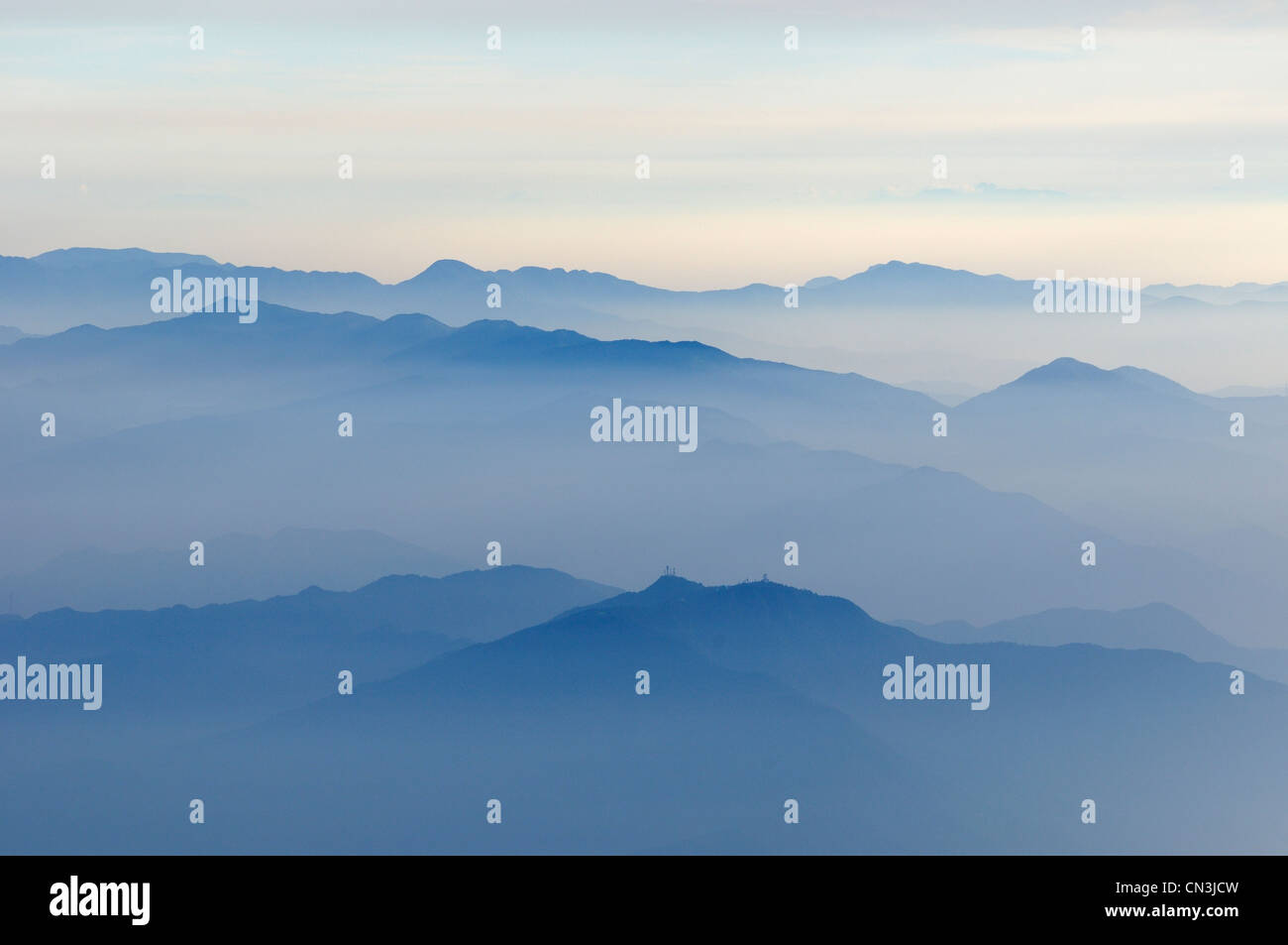 mountain ridges and skyline in soft pale haze morning atmosphere, Japan ...