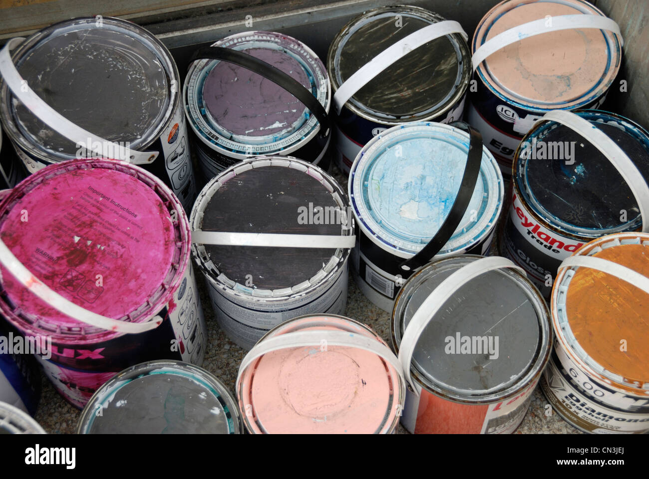 Used paint tins Stock Photo - Alamy