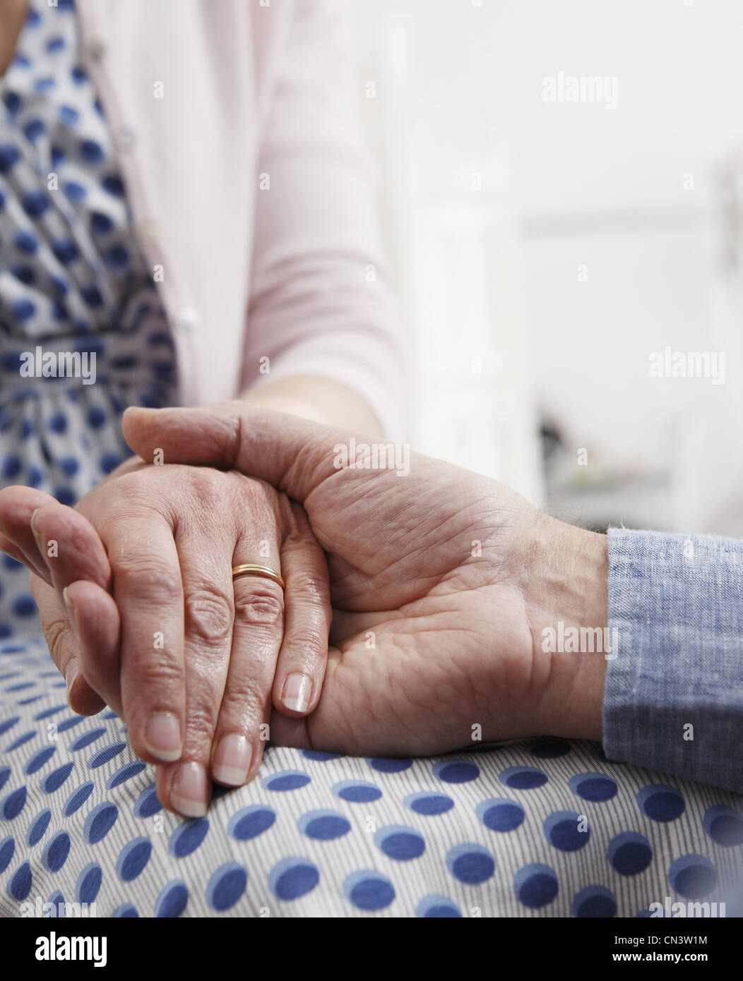 Close view two seniors hands hi-res stock photography and images - Alamy
