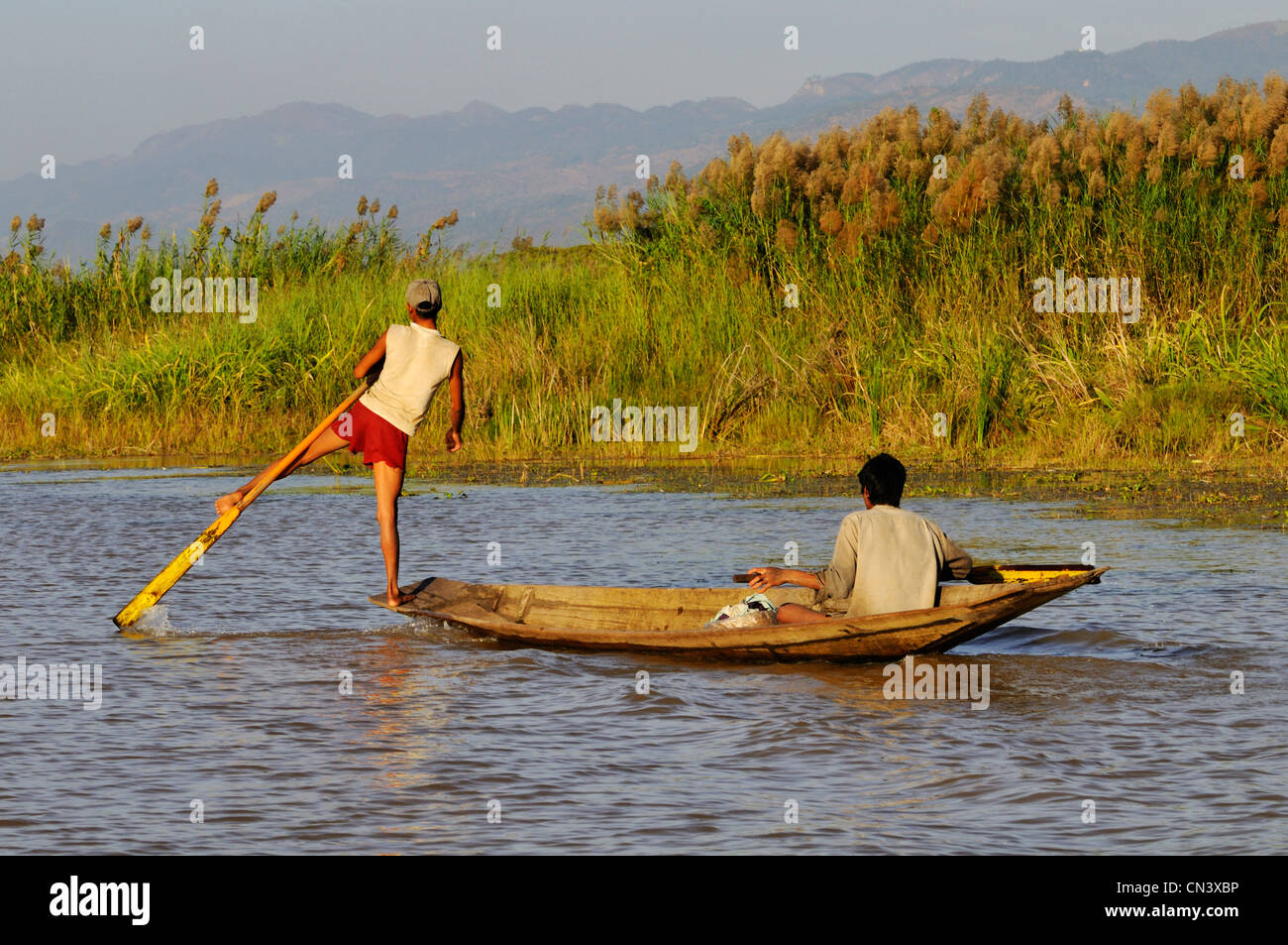 Myanmar (Burma), Shan State, Inle Lake, boatman of Intha ethnic group ...