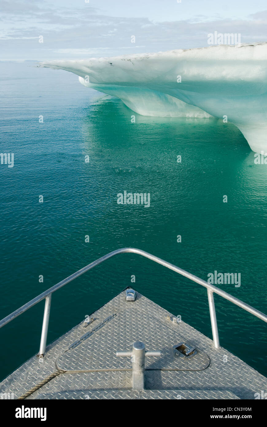 Boat and iceberg, Eclipse Sound, near Pond Inlet, Nunavut, Canada Stock ...