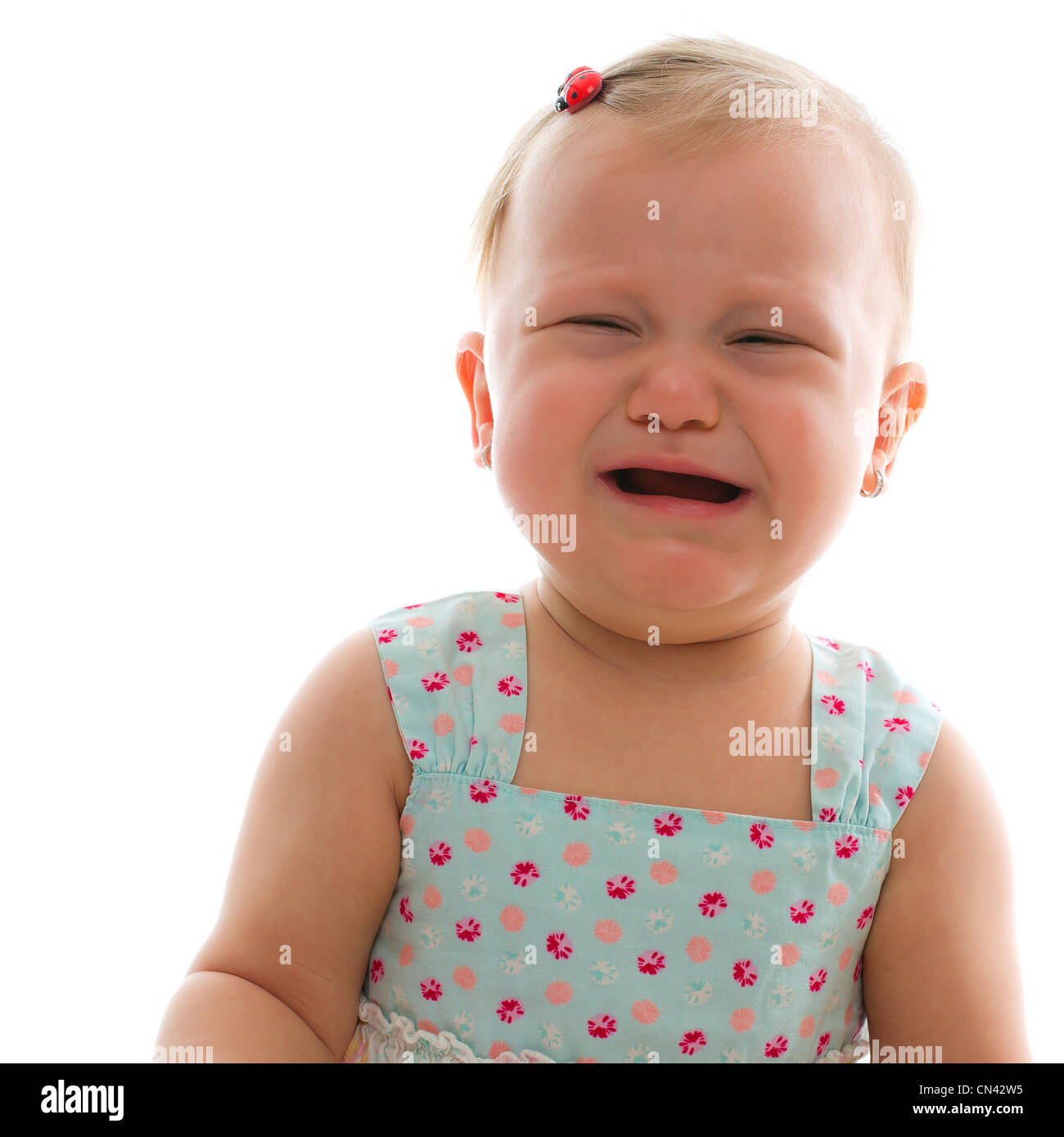 crying baby girl - studio shot over white Stock Photo - Alamy