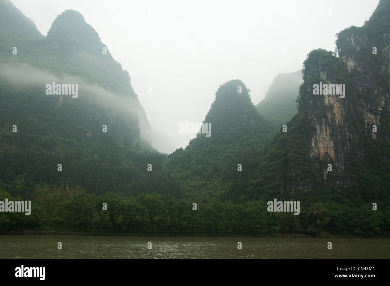 Karst formations covered with rich vegetation, Li River, near Yangshuo ...