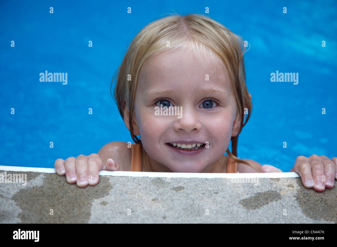 Girl at Edge of Pool Stock Photo - Alamy