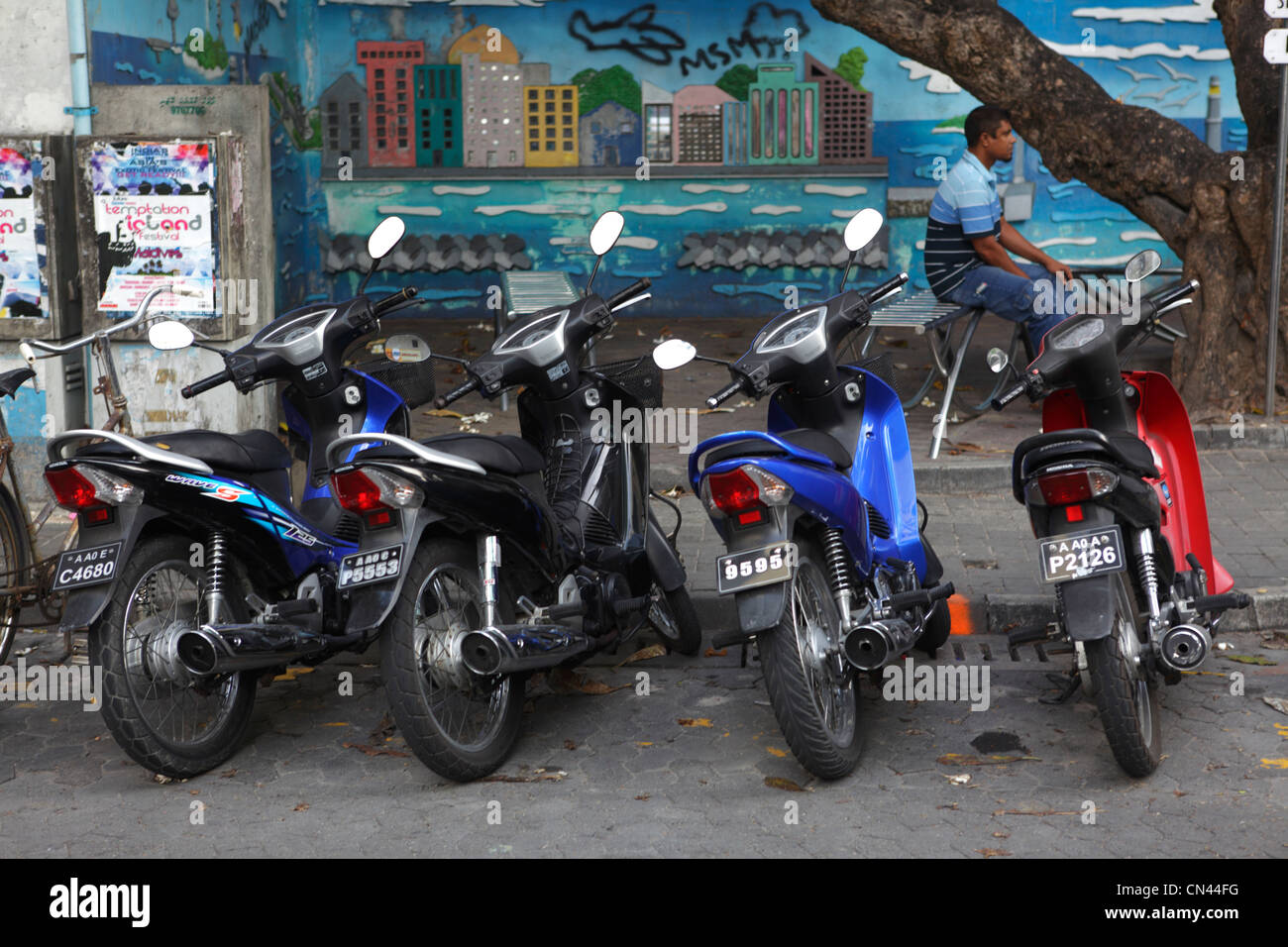 Motorbike transportation the center of Male, Maldives Stock Photo - Alamy
