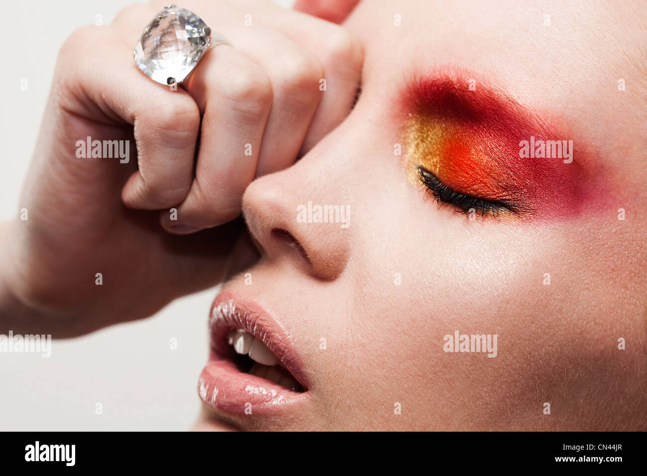 model wearing orange eye shadow Stock Photo - Alamy
