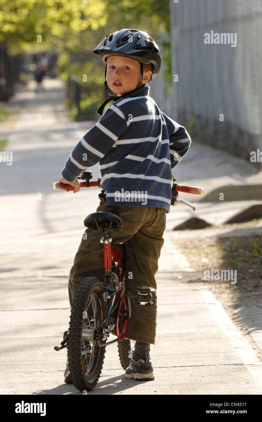 Young Boy Riding Bicycle, Toronto, Ontario Stock Photo - Alamy