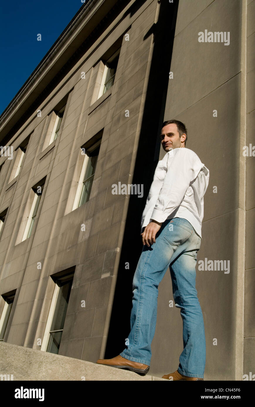 Man Standing in front of City Buildings, Toronto, Ontario Stock Photo ...