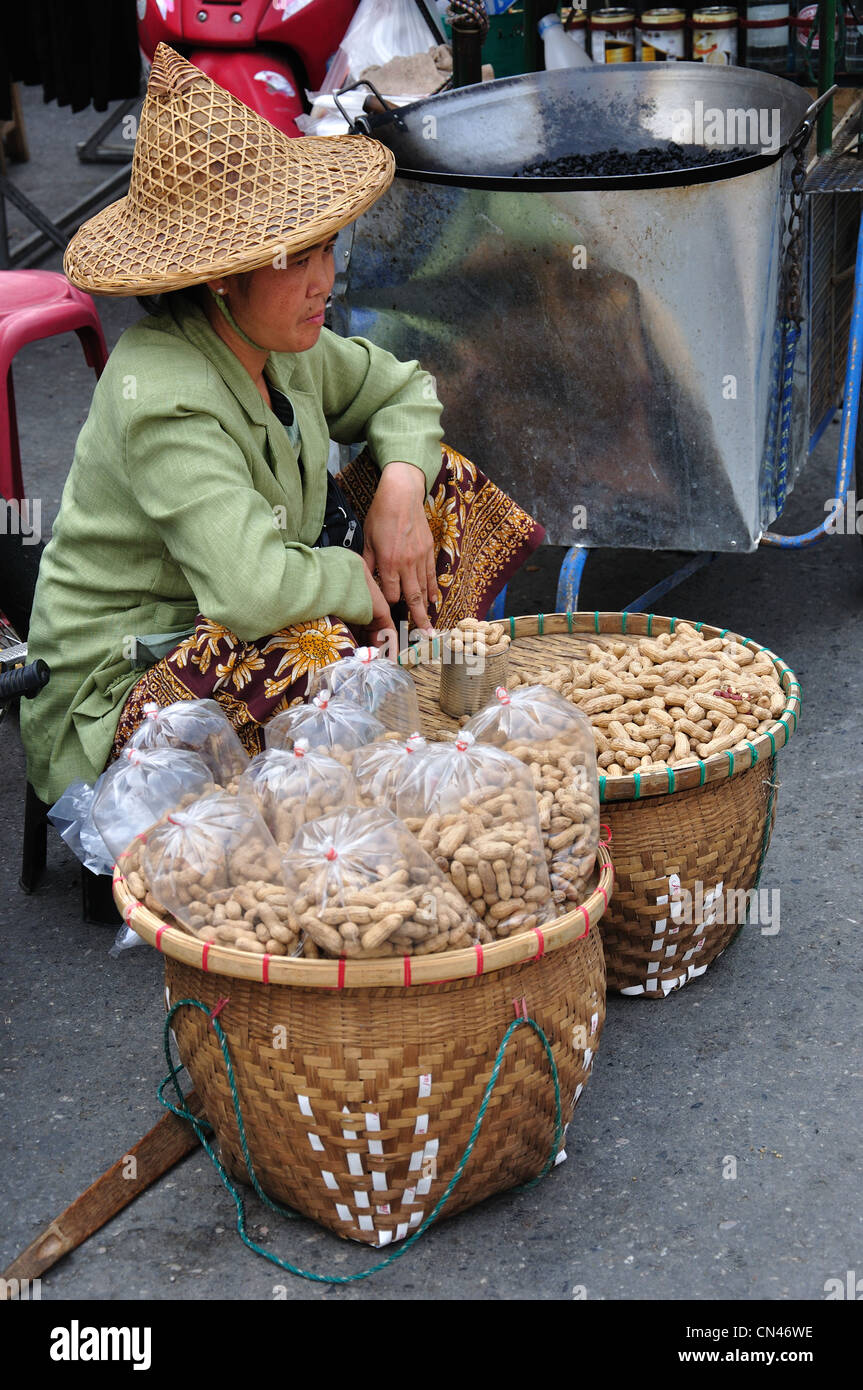 Woman selling peanuts at Thai-Myanmar border town of Maesai, Maesai ...