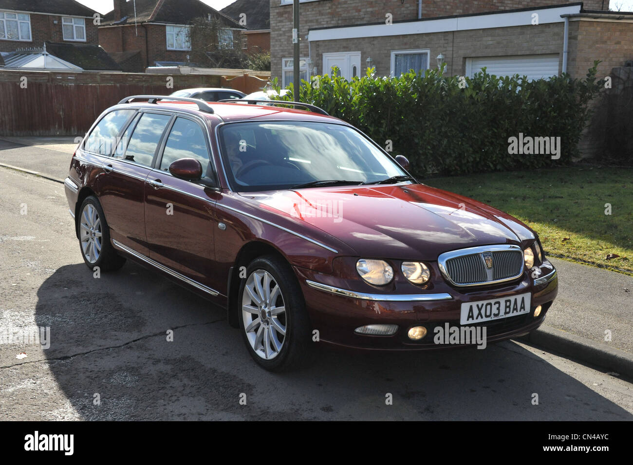 A Rover 75 Tourer being driven down a residential street in Surrey ...