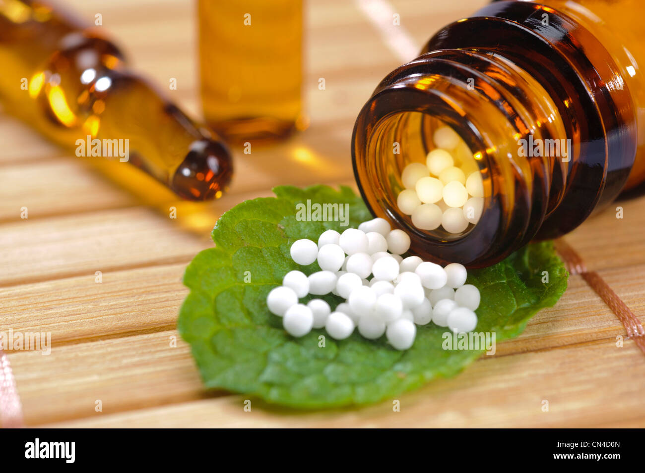 homeopathic globules on leaf Stock Photo - Alamy