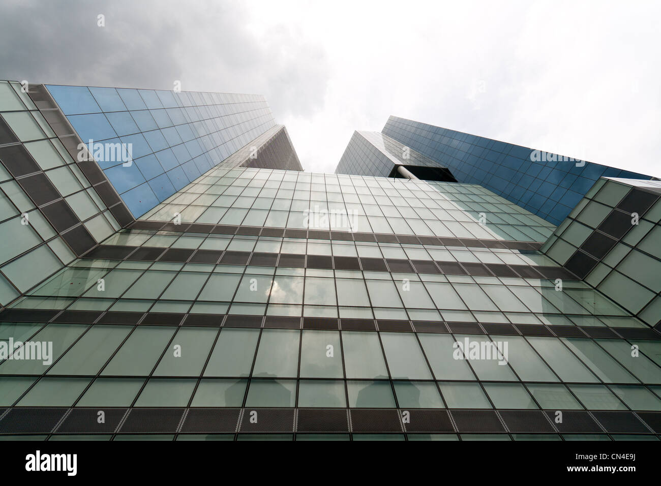 Looking upwards an exterior of a modern skyscraper Stock Photo - Alamy