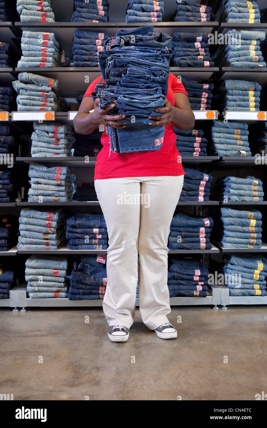 Jeans shopping woman stack hi-res stock photography and images - Alamy