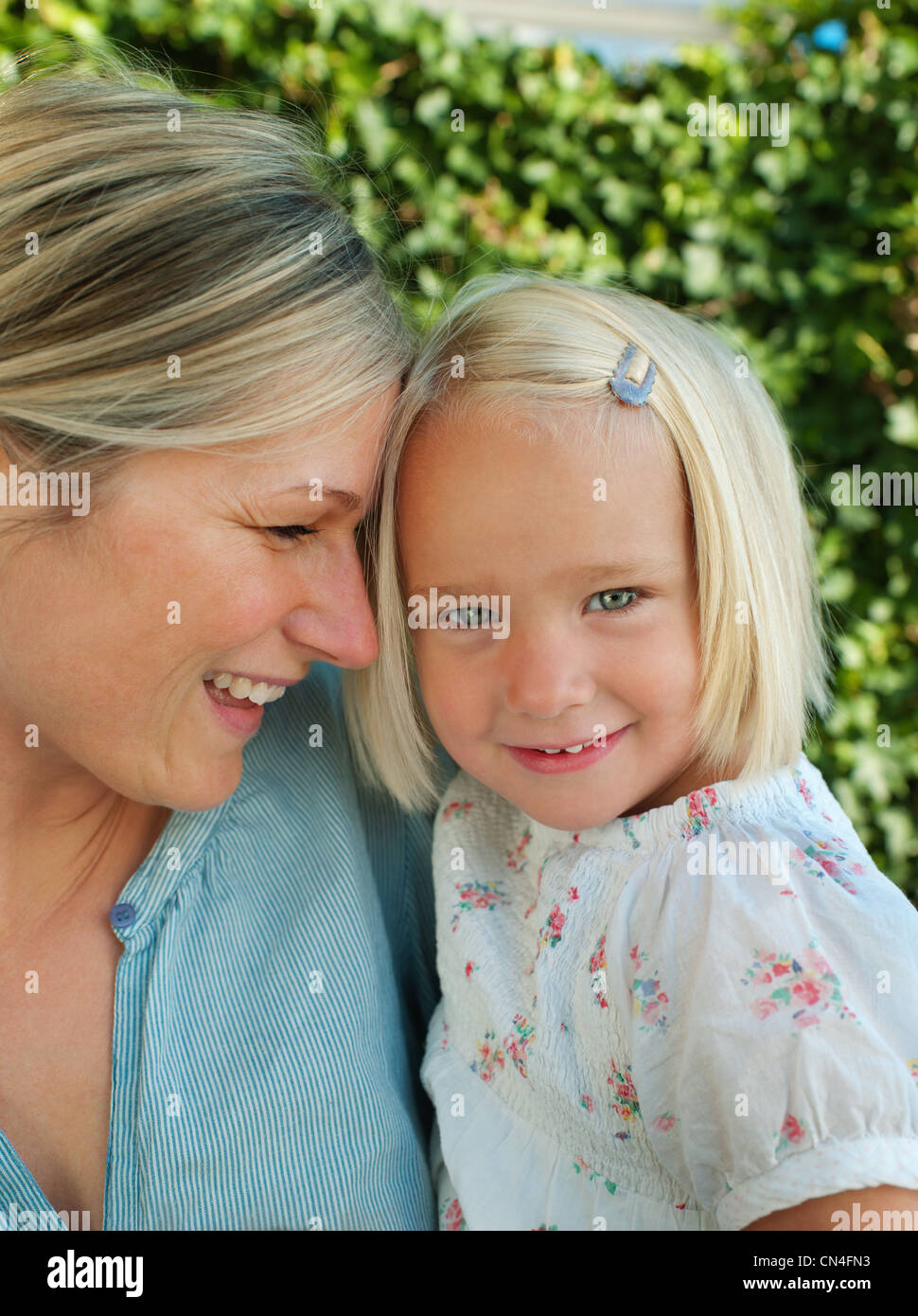Mother and daughter, smiling, portrait Stock Photo - Alamy