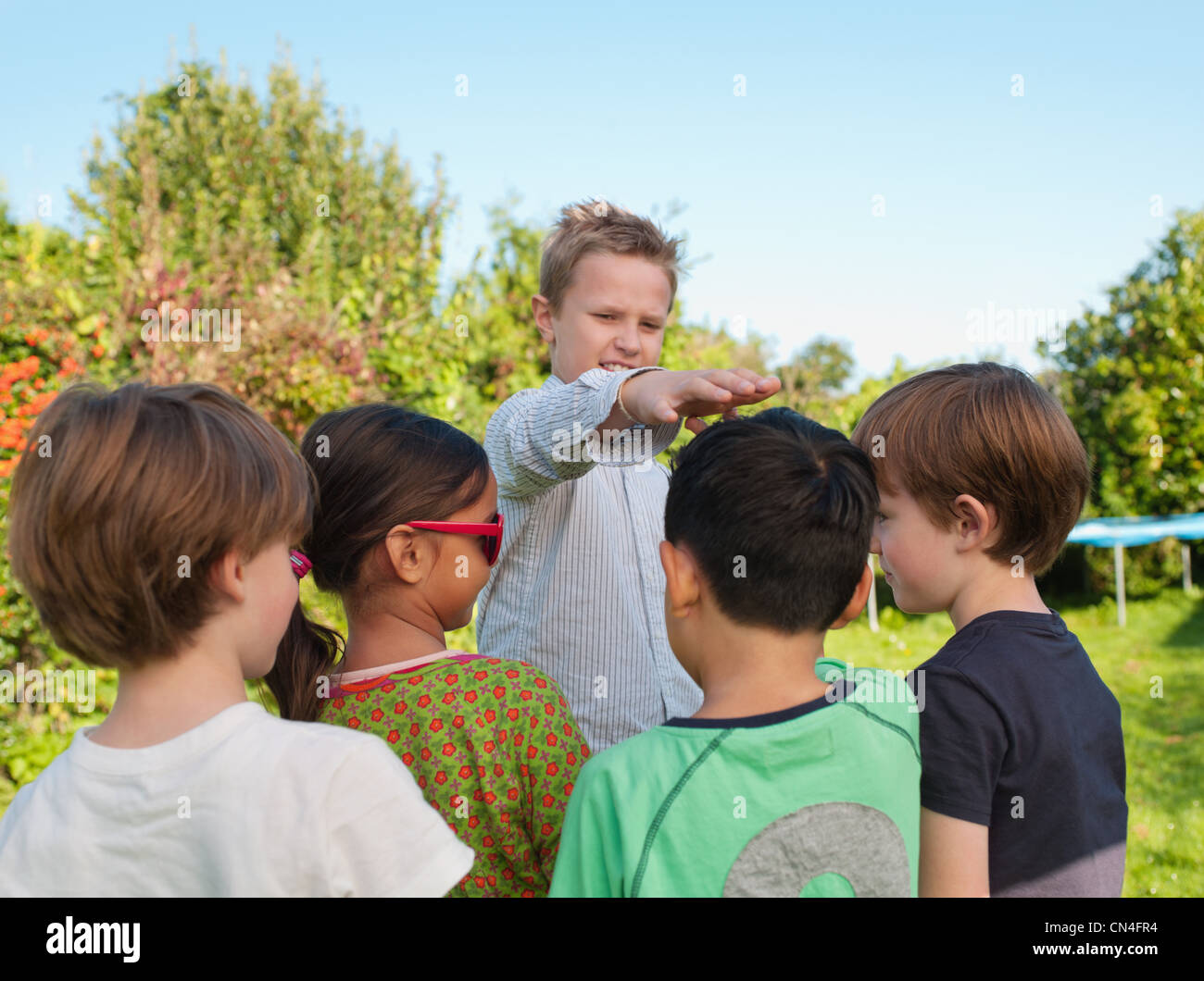 Children playing outside Stock Photo - Alamy