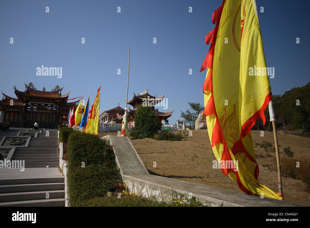 Steps leading up to Monastery with temple flags at the side Stock Photo ...
