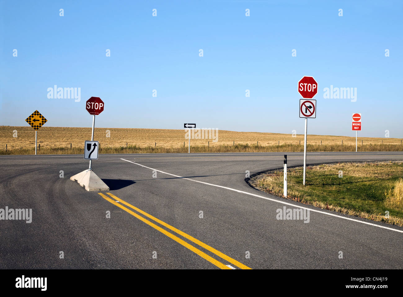 Signs on empty highway Stock Photo - Alamy Signs on empty highway Stock Photo - Alamy