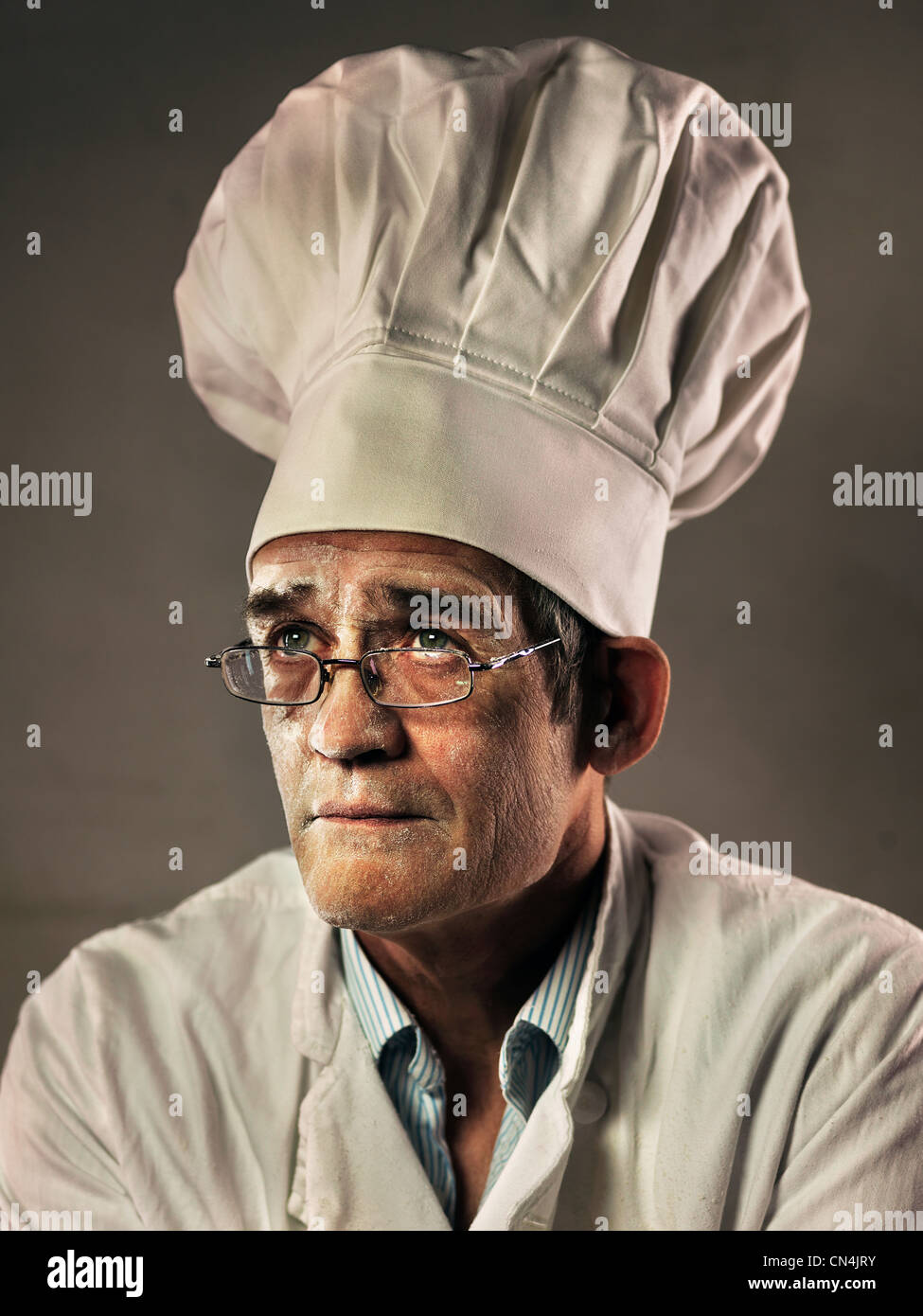Portrait of a baker Stock Photo - Alamy