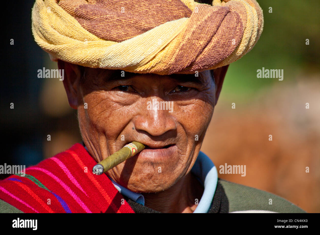 Tribal man in the market at Thaung Tho Kyaung, Inle Lake, Burma ...