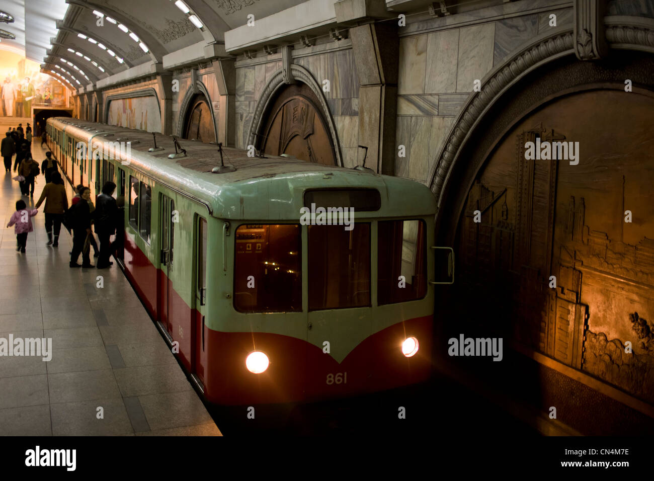 North Korea, Pyongyang, Puhung station, passengers getting on the train ...