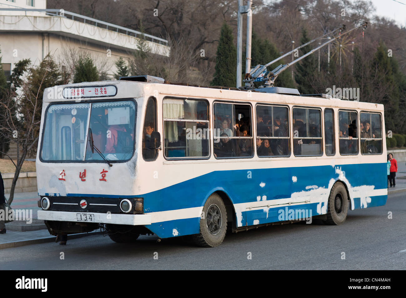 North Korea, Pyongyang, trolley bus full of passengers Stock Photo - Alamy