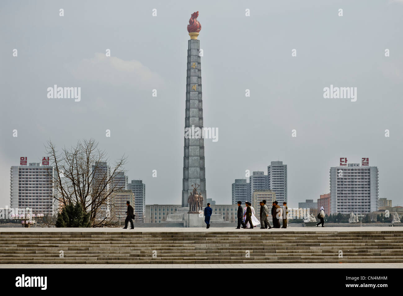 North Korea, Pyongyang, Kim Il-Sung square, pedestrians in front of the ...