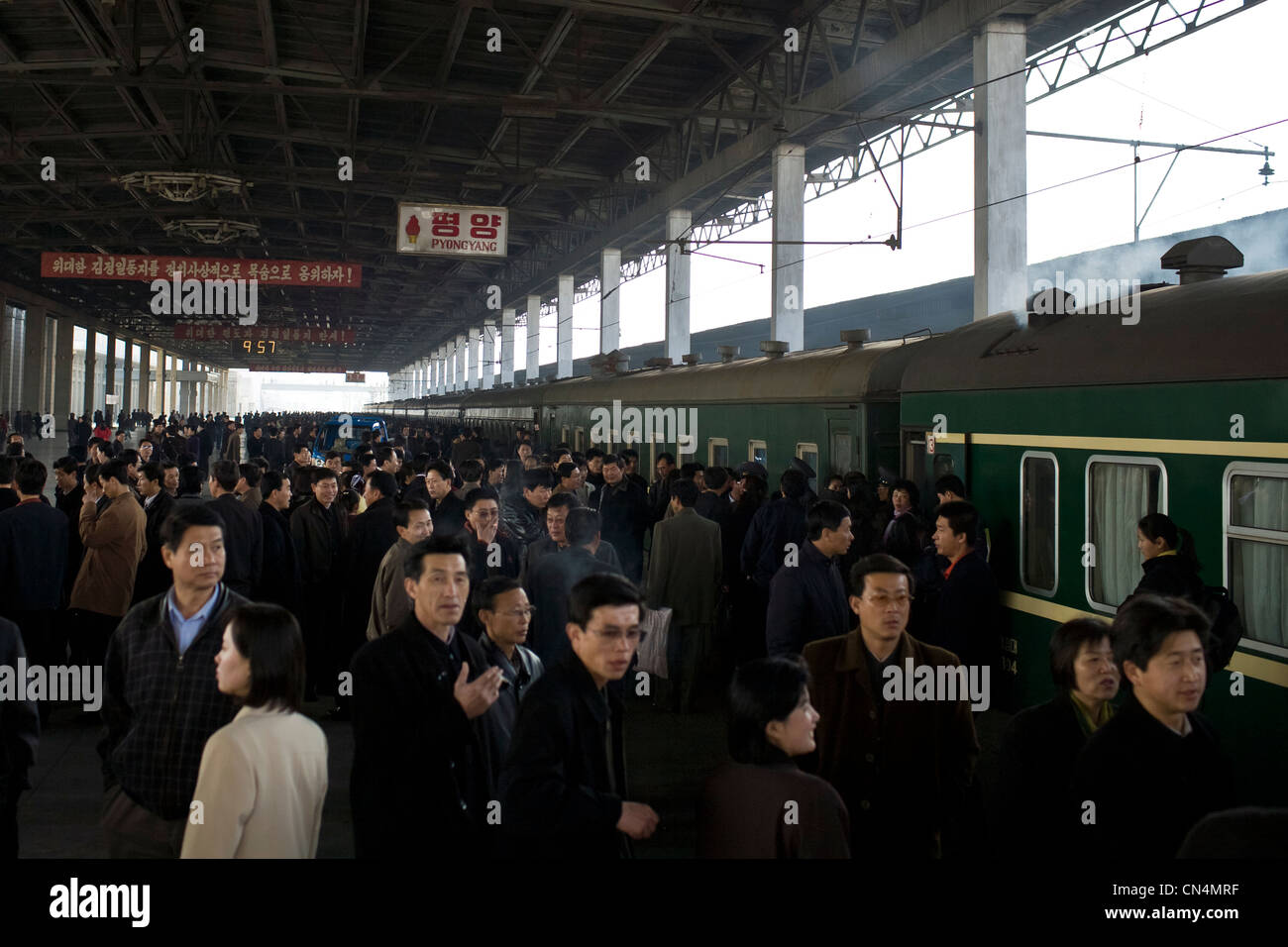 North Korea, Pyongyang, Railway station, crowd in front the train ...