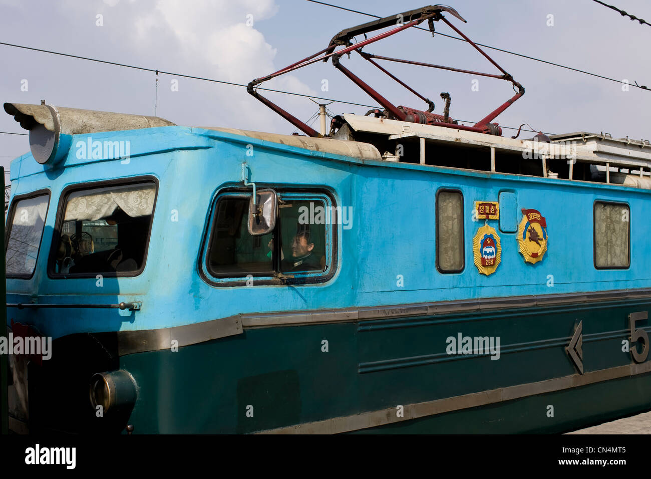 North Korea, Pyongyang, Railway station, locomotive awaiting departure ...