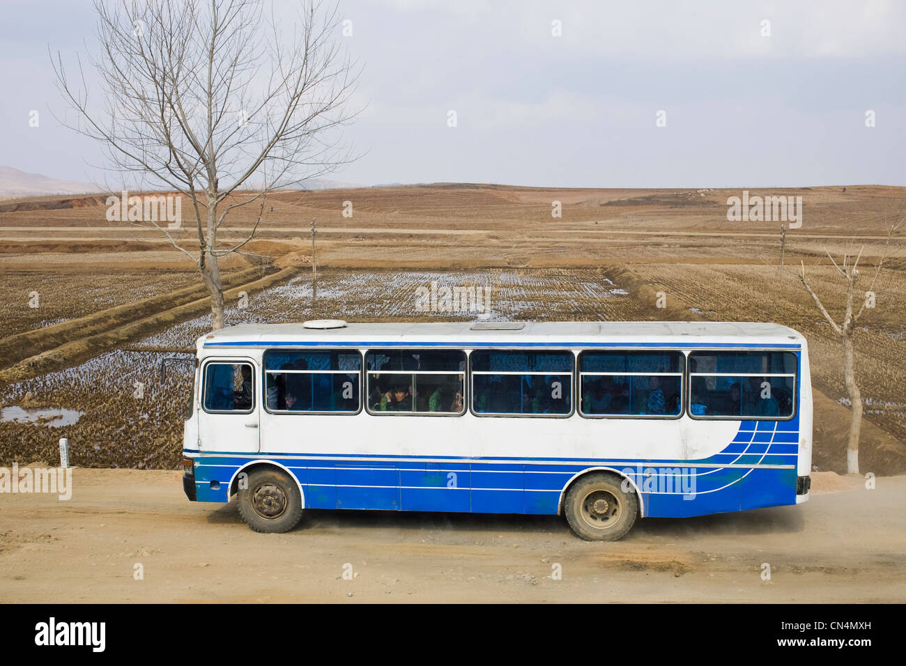 North Korea, North Pyongan province, Yongal, bus on a countryside road ...