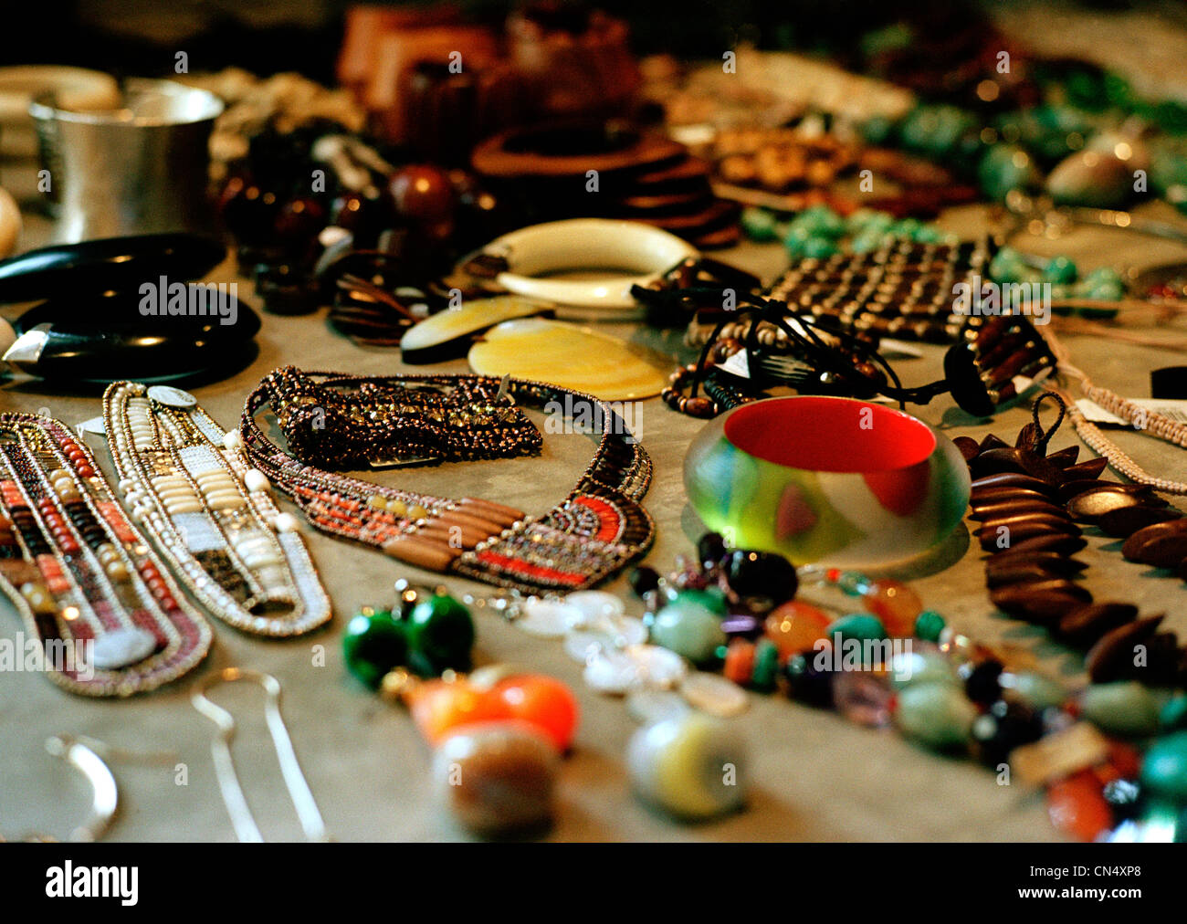 Hand made jewellery on a table Stock Photo - Alamy