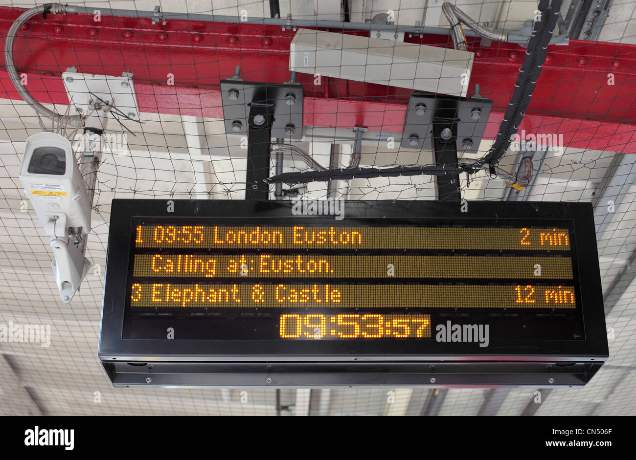 Destination and times of trains on London railway station platform ...