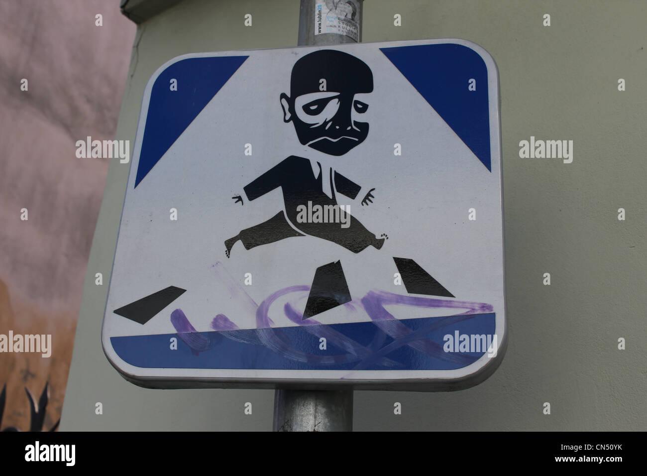 a funny pedestrian crossing sign in Vilnius, Lithuania Stock Photo - Alamy