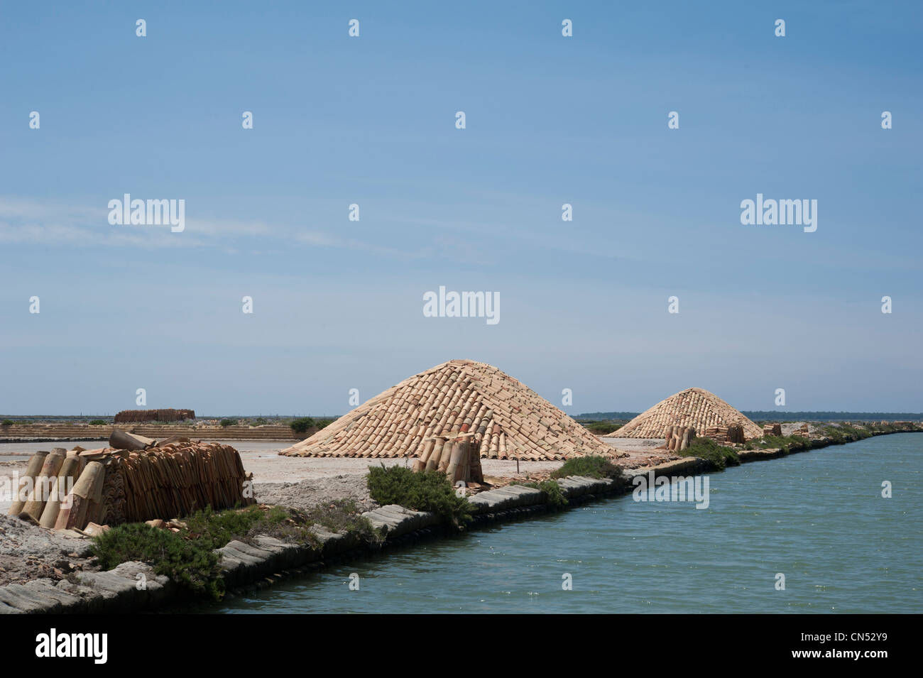 A pile of traditionally harvested sea salt evaporated from sea water ...