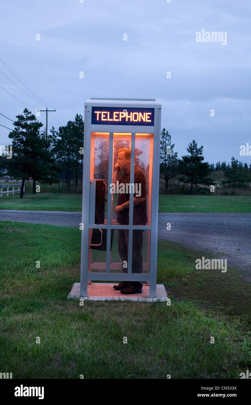 Man in a Phone Booth, Toronto, Ontario Stock Photo - Alamy