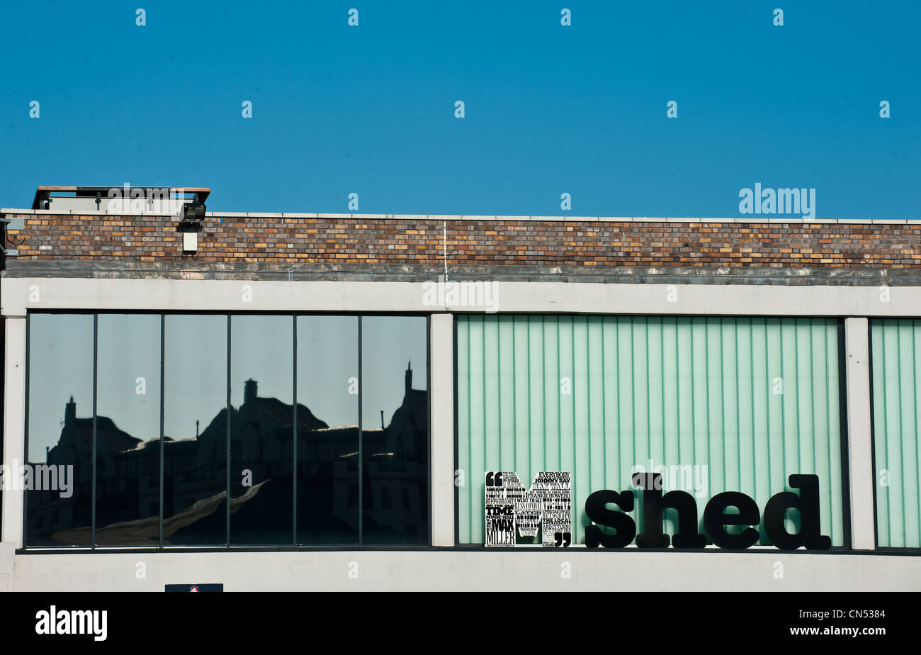 view of the M Shed museum in Bristol set against a clear blue sky with ...