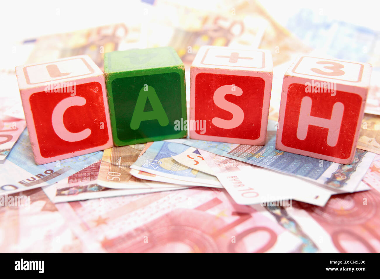 assorted childrens toy letter building blocks against a white ...