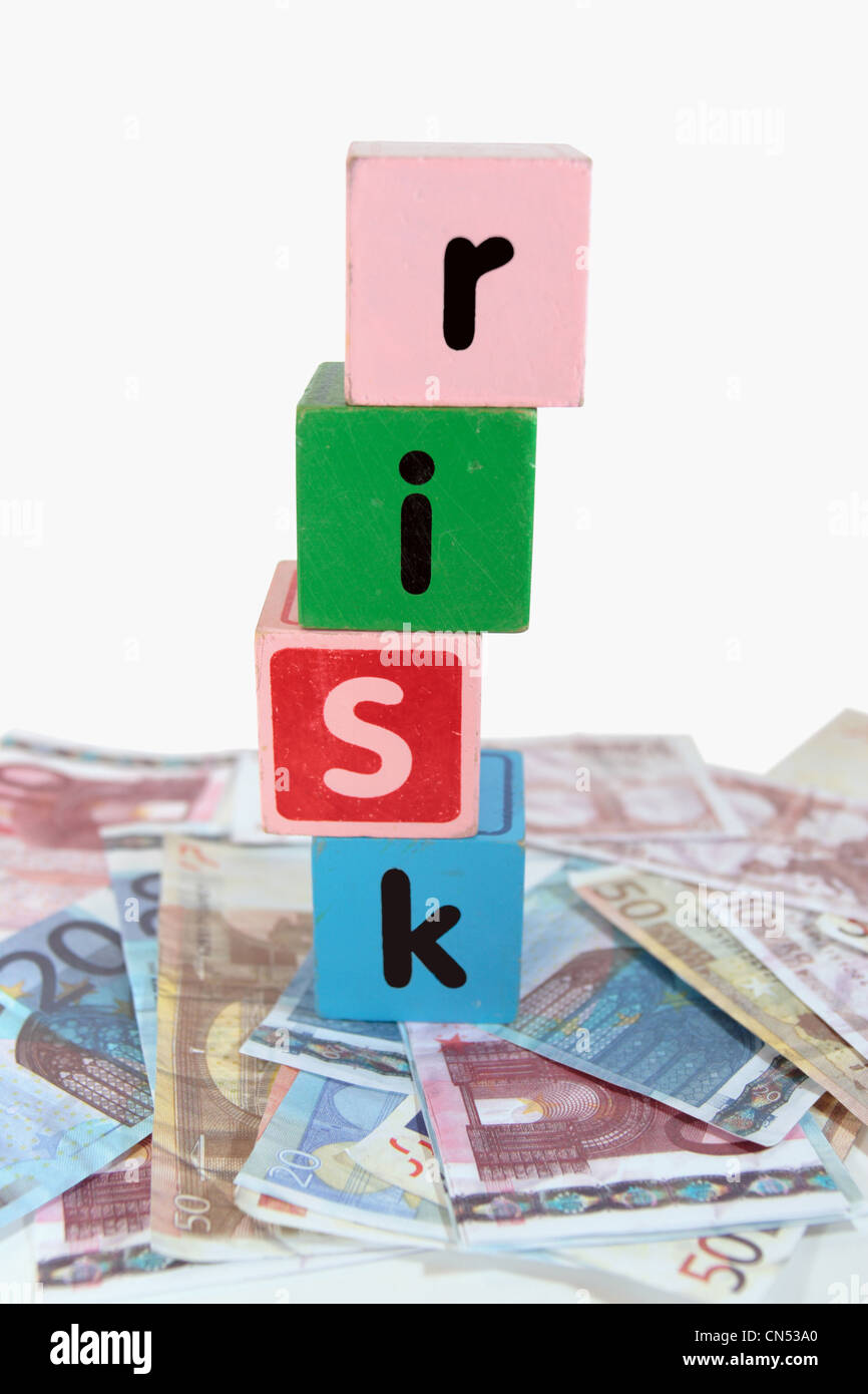 assorted childrens toy letter building blocks against a white ...