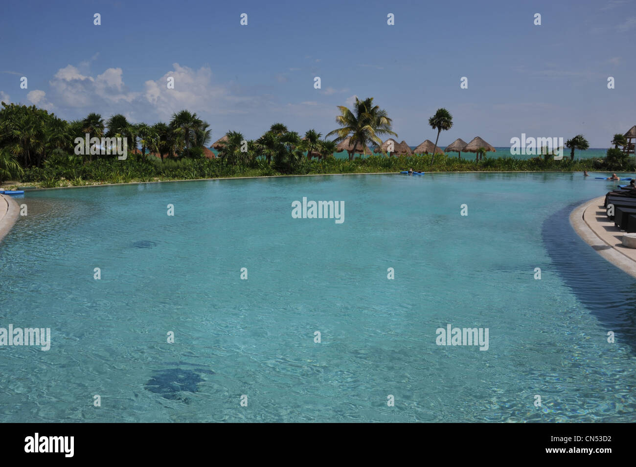 Infinity Pool at a resort in Cancun Mexico Stock Photo - Alamy