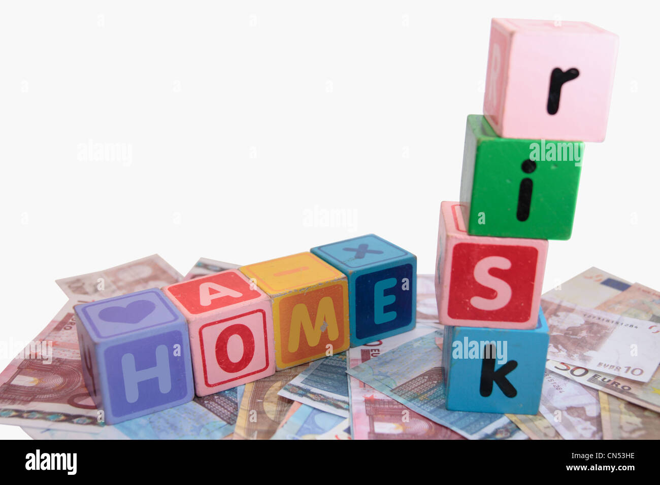 assorted childrens toy letter building blocks against a white ...