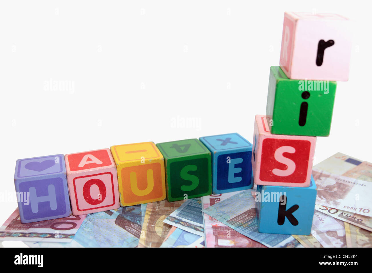 assorted childrens toy letter building blocks against a white ...