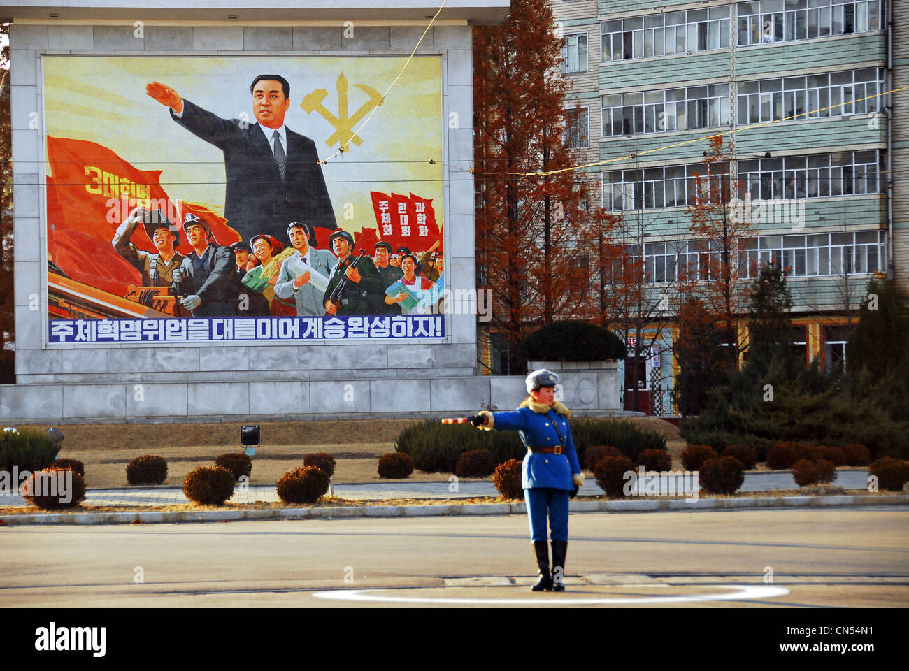 North Korea, Pyongyang, police woman control trafic in a street without ...