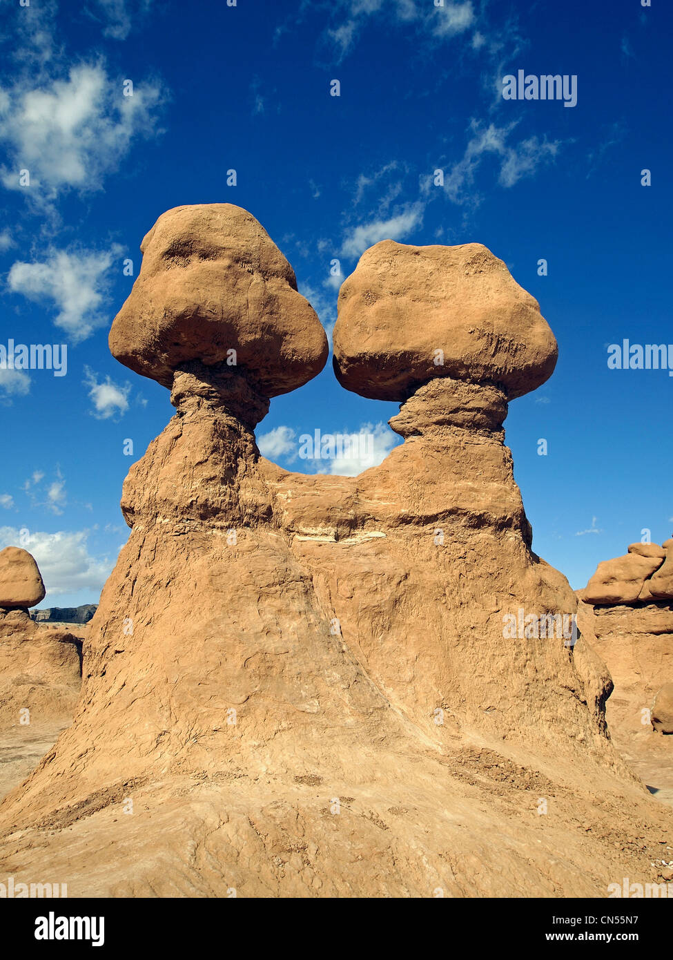 A pair of sandstone balanced rocks in a desert area Stock Photo - Alamy