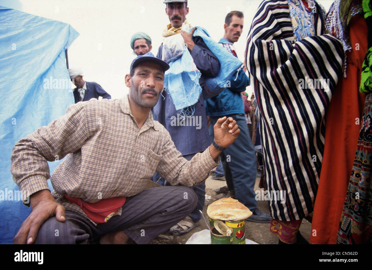 Moroccan sandwich vendor at a market in Imilchil, Central Atlas ...