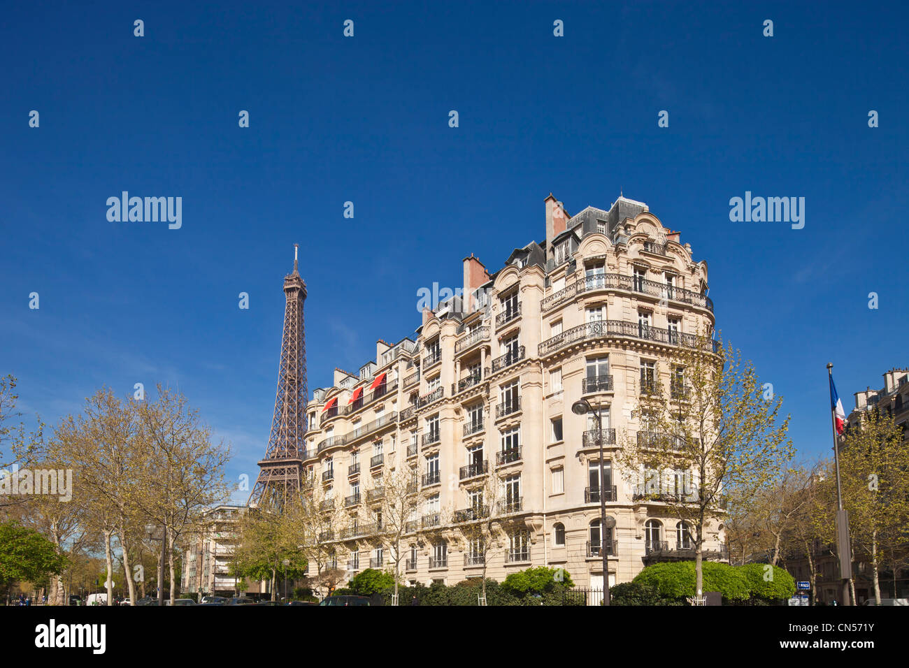 France, Paris, Haussmann building type facade and the Eiffel Tower ...