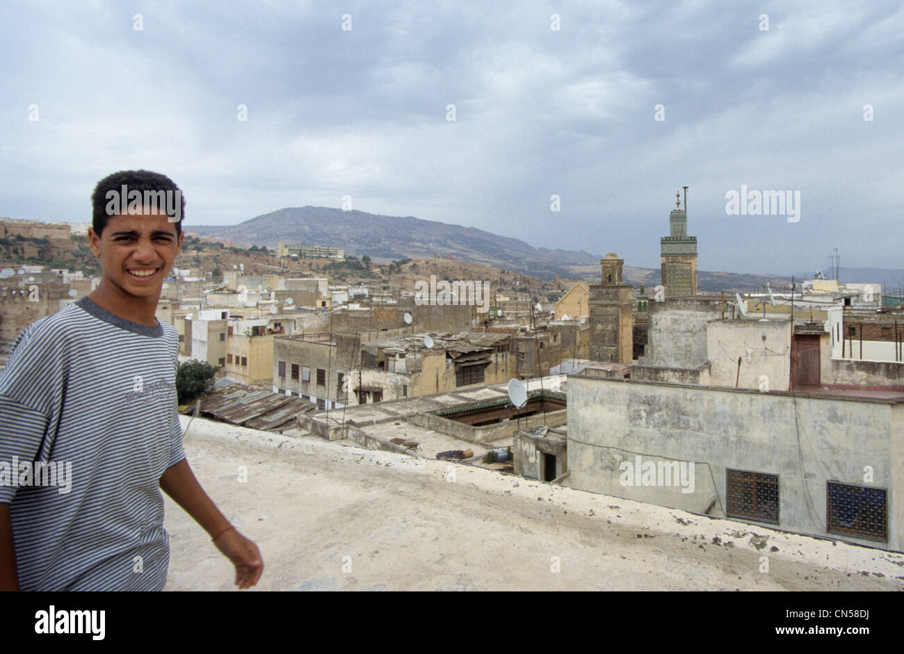 Boy on a terrace of Midelt, Morocco Stock Photo - Alamy