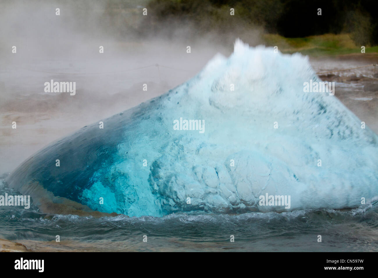 Iceland, Haukadalur region, Geysir, water bubble and steam under ...